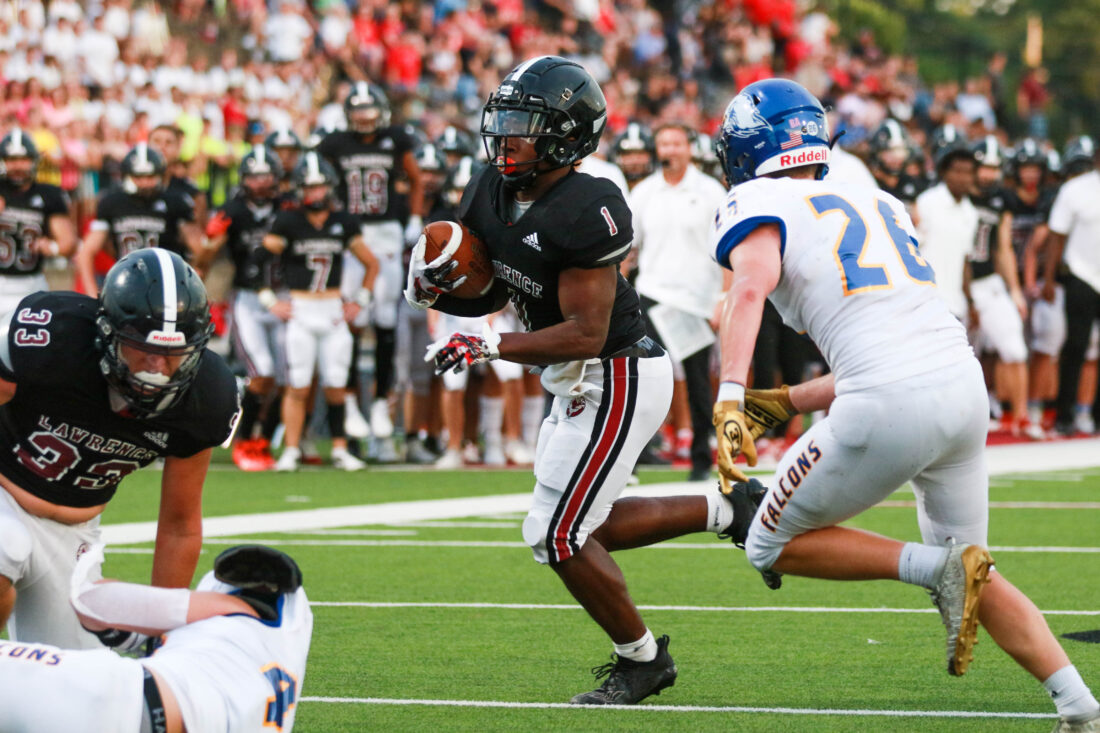 LHS football drops wild season opener, 36-32 to visiting Olathe South ...